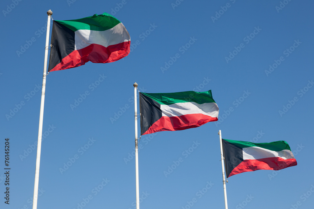 Three national flags of Kuwait waving in the wind Stock Photo | Adobe Stock