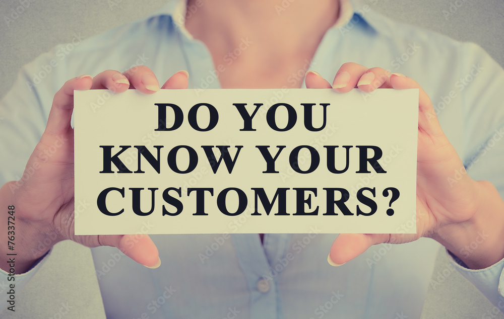 businesswoman hands holding sign do you know your customers Stock Photo ...