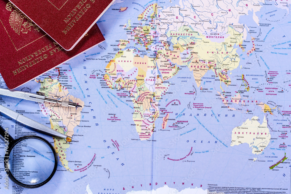 open world map with magnifying glass, compasses and passport Stock ...