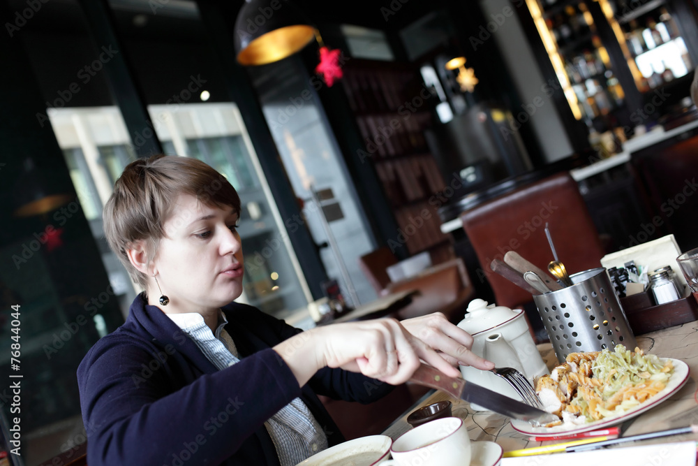 Woman has lunch Stock Photo | Adobe Stock