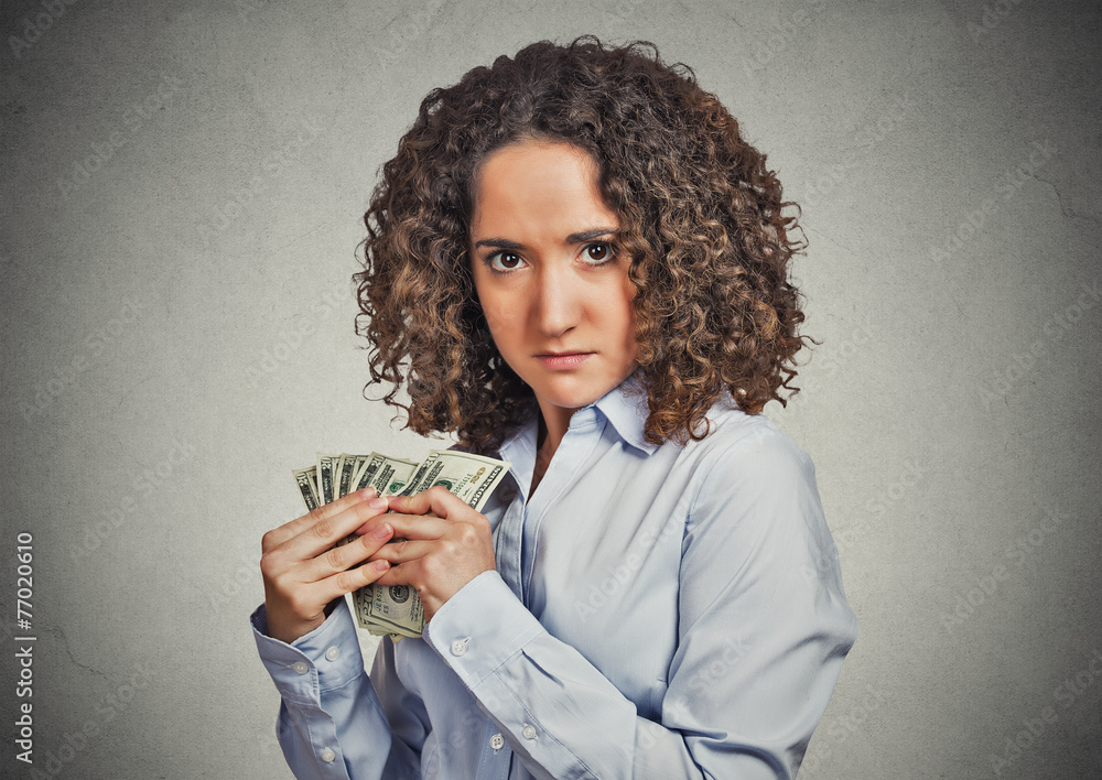 greedy woman corporate employee holding dollar banknotes Stock Photo ...