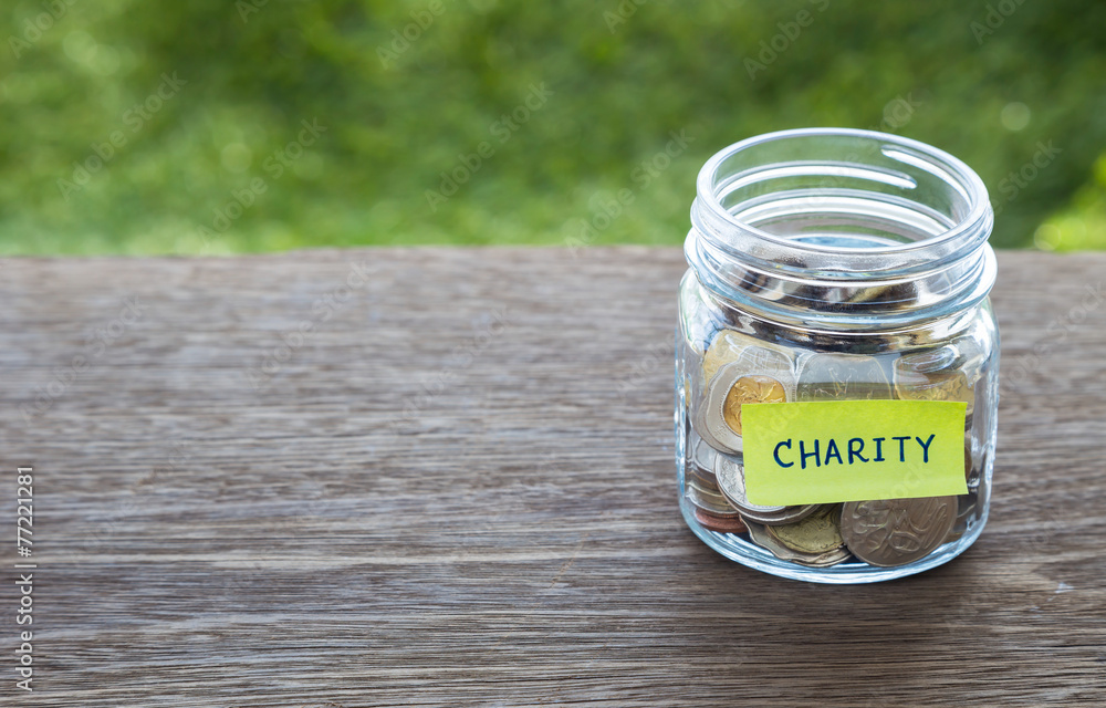 Charity donation money glass jar Stock Photo | Adobe Stock