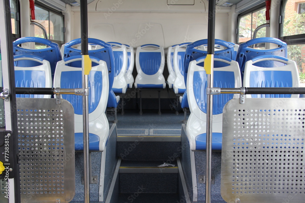 Blue and grey seats, Interior of a modern empty city bus, Stock Photo ...