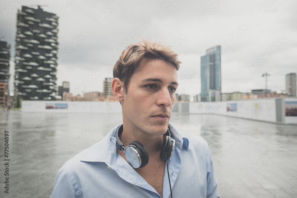 young model hansome blonde man with headphones Stock Photo | Adobe Stock