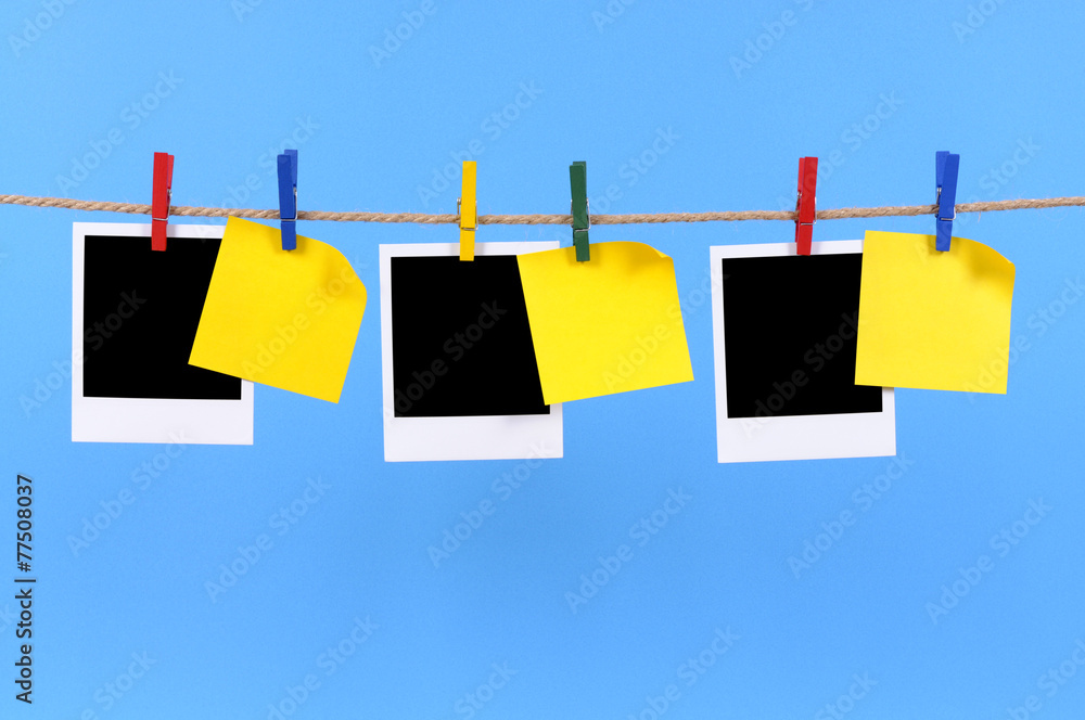 Blank polaroid style photo print frame and sticky post it notes on a ...