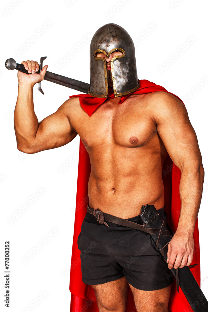 well looking warrior in red mantle and helmet Stock Photo | Adobe Stock