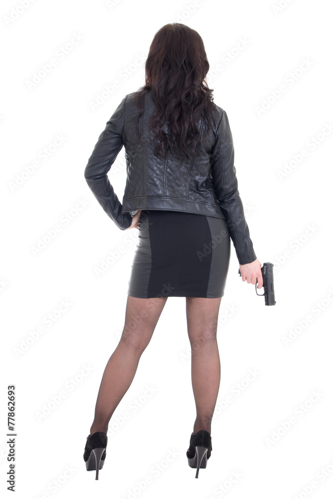 back view of sexy woman in black holding gun isolated on white Stock ...