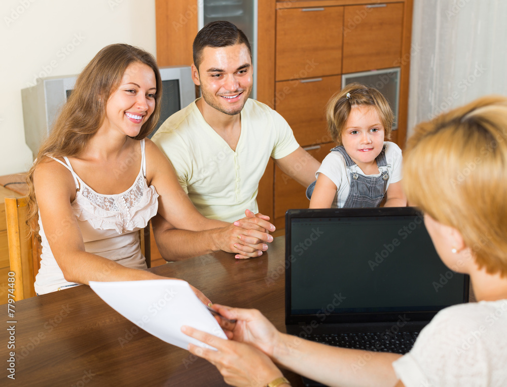 Family with insurance agent Photos | Adobe Stock