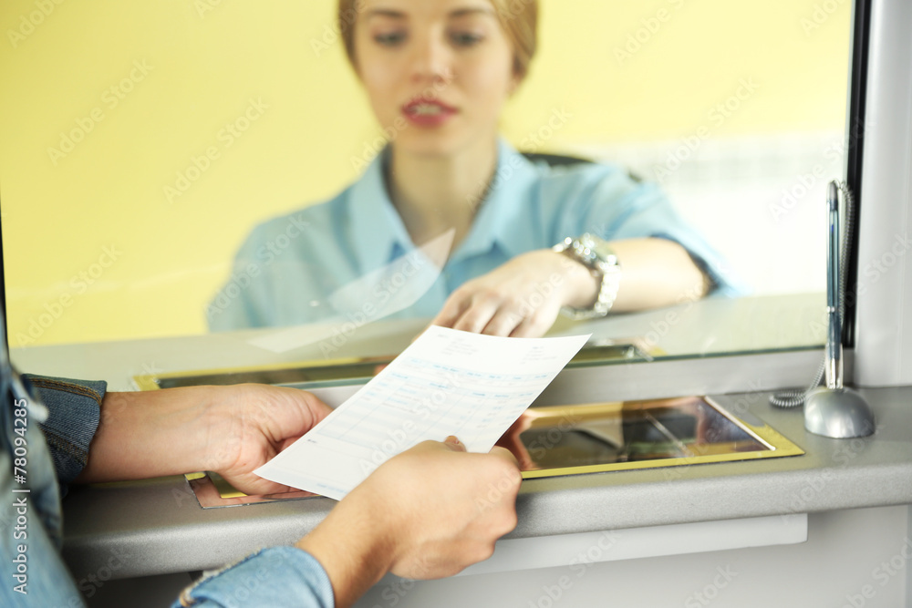 Teller window with working cashier. Concept of payment of Stock Photo ...