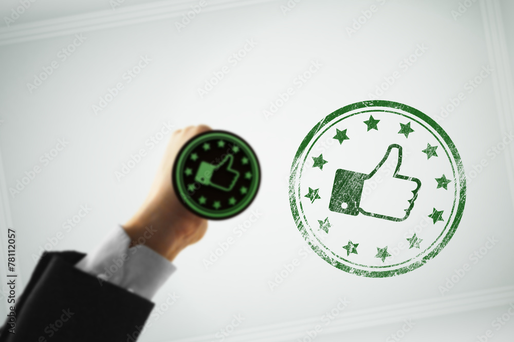 Green stamp thumbs-up Stock Photo | Adobe Stock