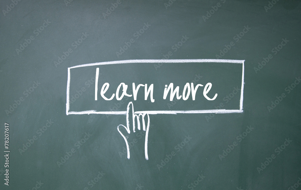 finger click learn more symbol on blackboard Stock Photo | Adobe Stock