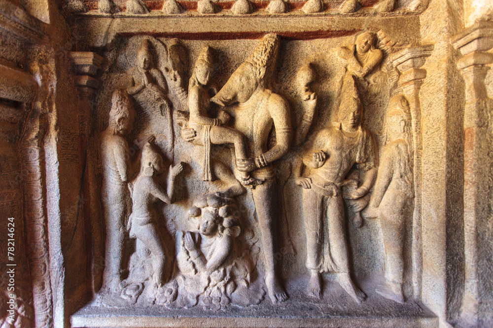 Sculptures inside of the Varaha cave temple (Unesco World Heritage Site) in Mamallapuram ...