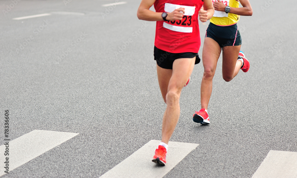 marathon runner legs running on city street Stock Photo | Adobe Stock