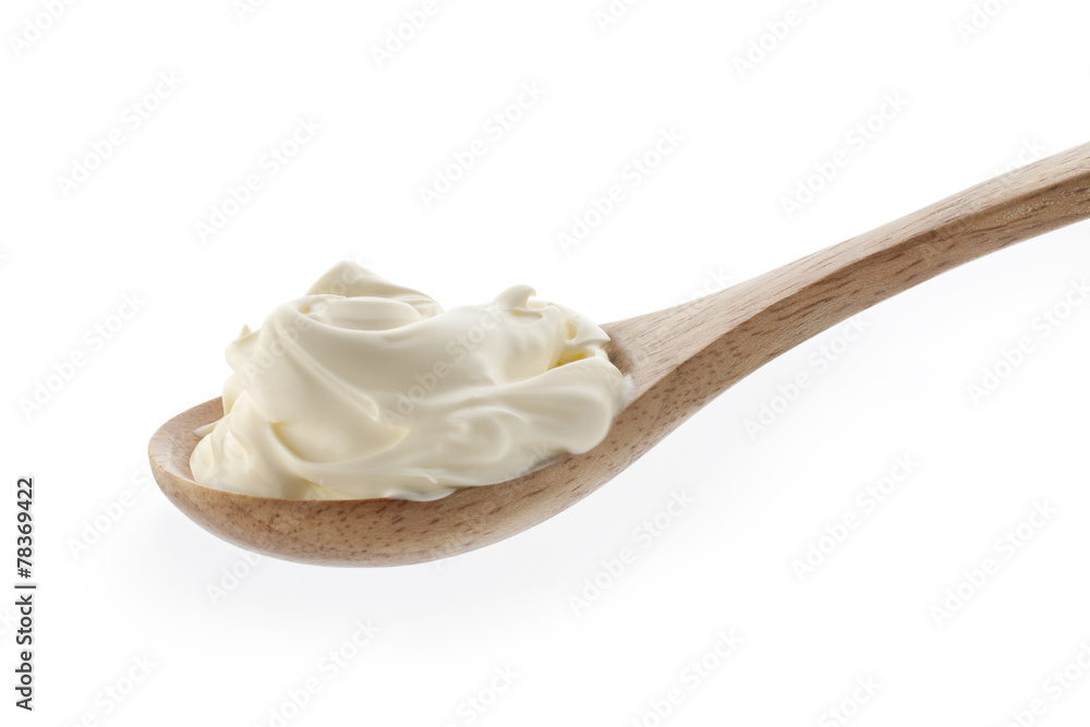 cream in spoon isolated foto de Stock | Adobe Stock