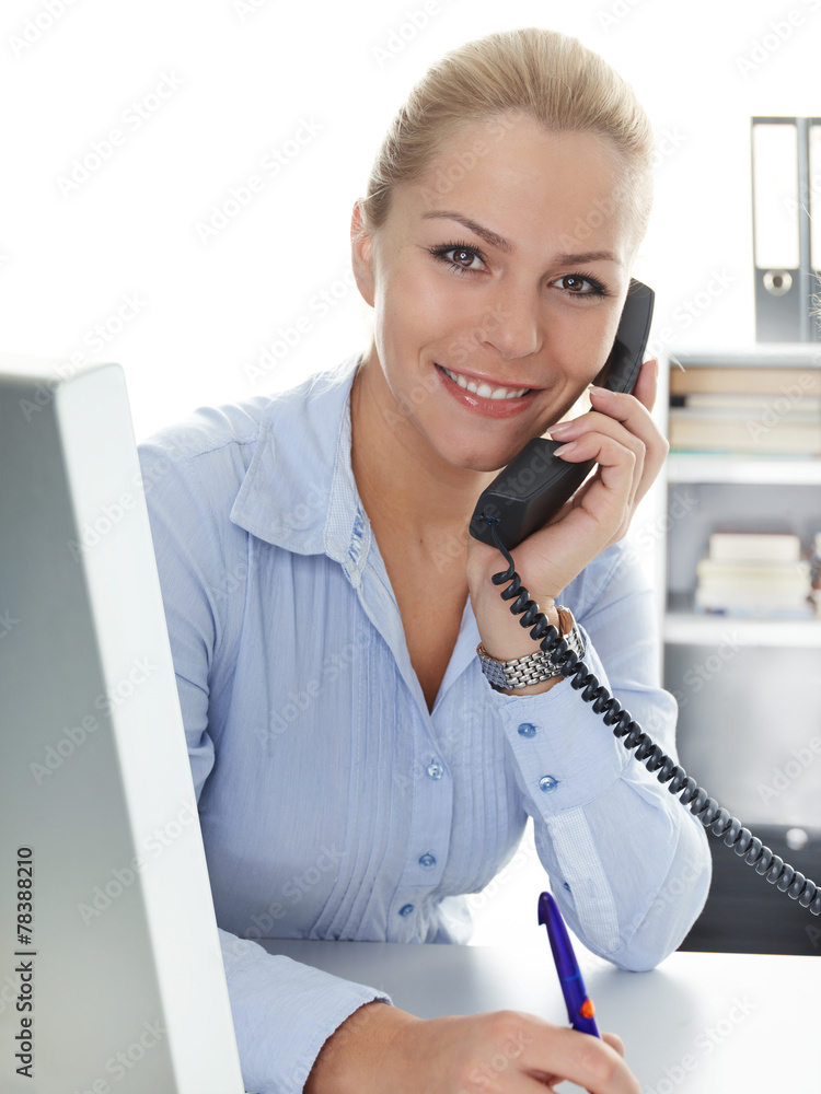 Female office assistant at the office Stock-Foto | Adobe Stock