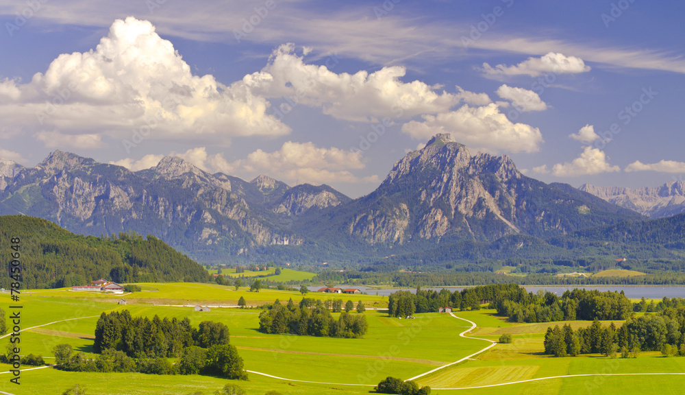 panorama landscape in Bavaria with lake Hopfensee and alps Stock Photo ...