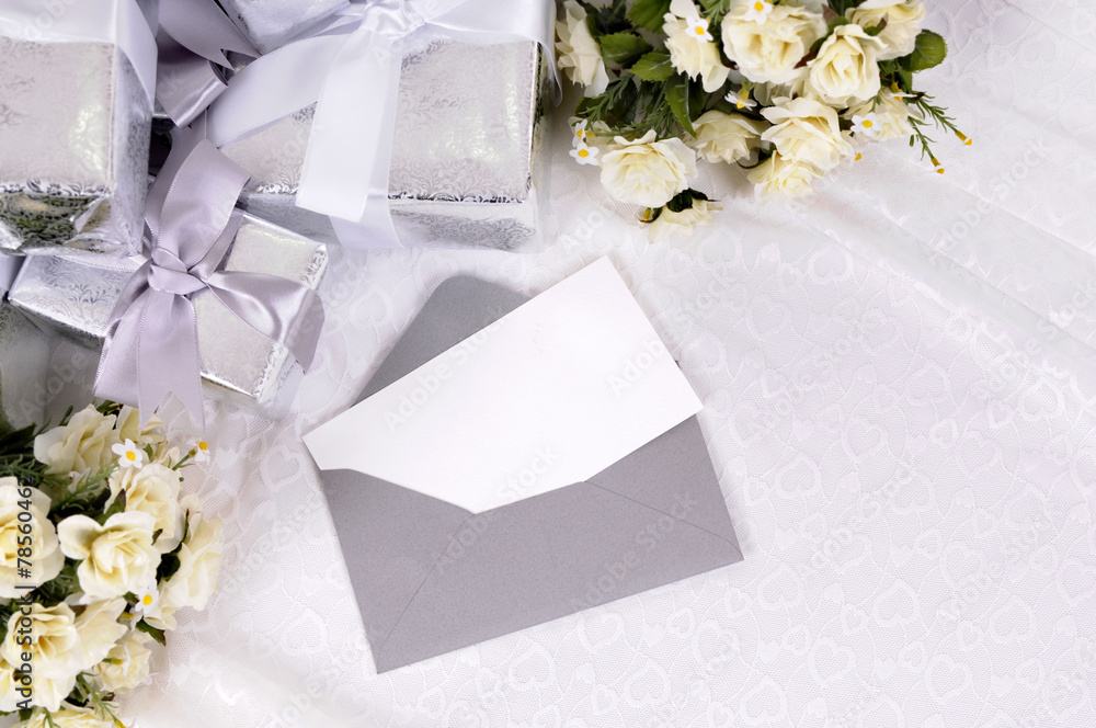Wedding gifts with invitation or thank you card Stock Photo | Adobe Stock