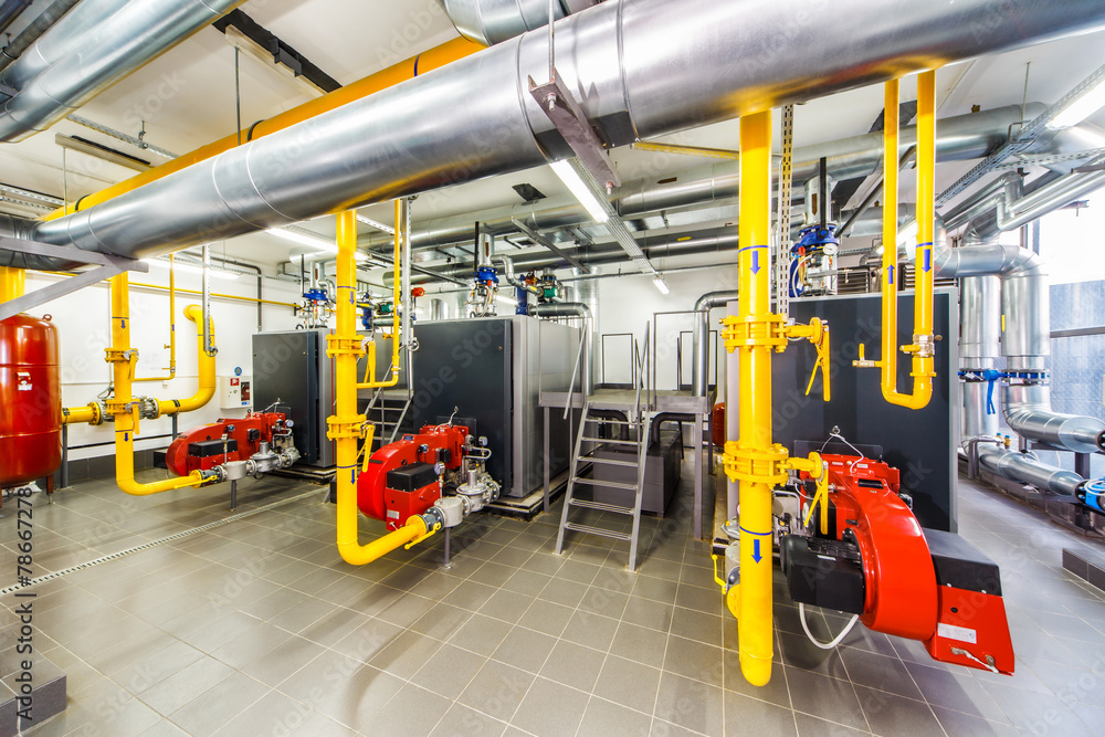 Foto de Interior gas boiler with three boilers do Stock | Adobe Stock