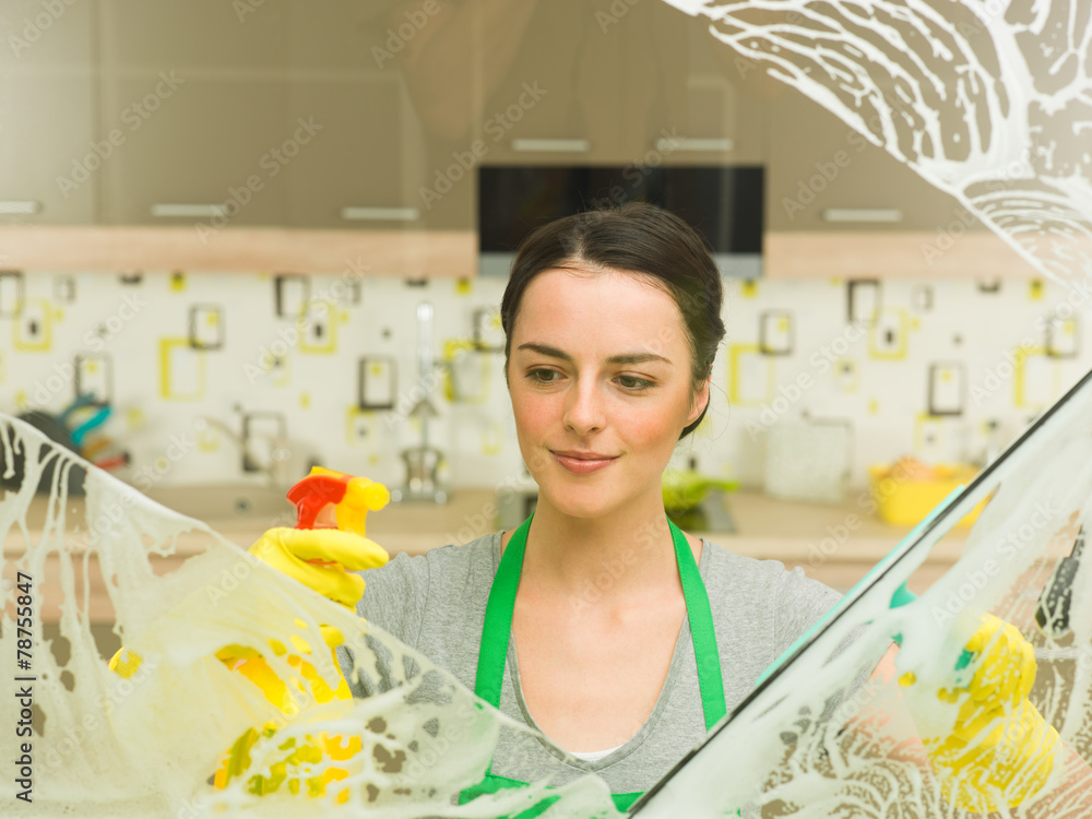 happy housewife doing chores Stock-Foto | Adobe Stock