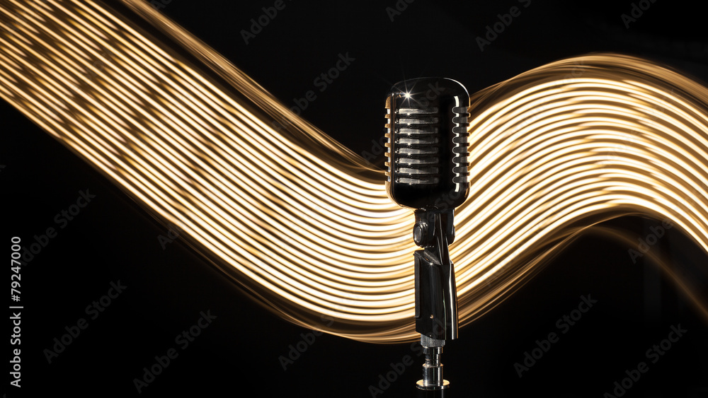 Vintage retro microphone on the black background with light wave Stock ...