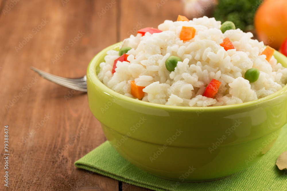 bowl full of rice isolated on wood Stock Photo | Adobe Stock