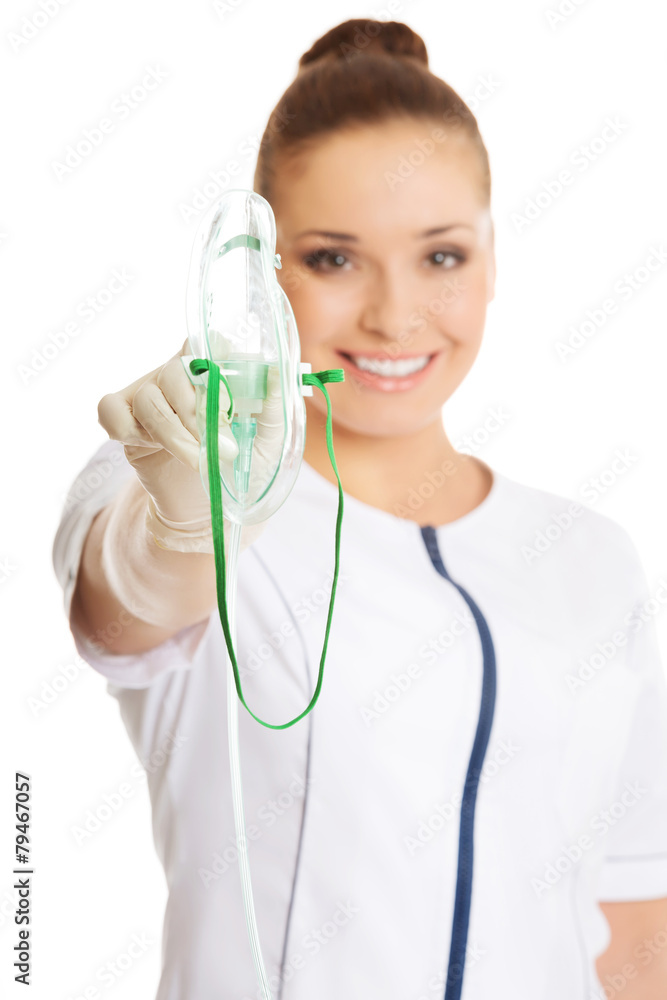 Female Doctor Holding Up Oxygen Mask Stock Foto Adobe Stock