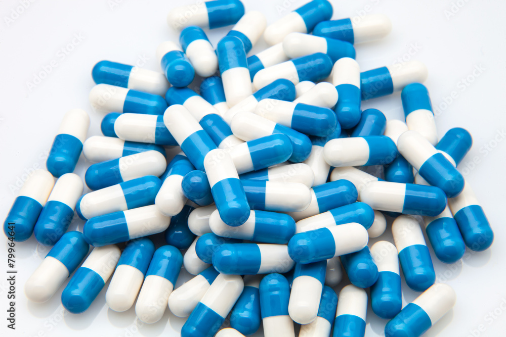 pastillas blancas y azules Stock Photo | Adobe Stock