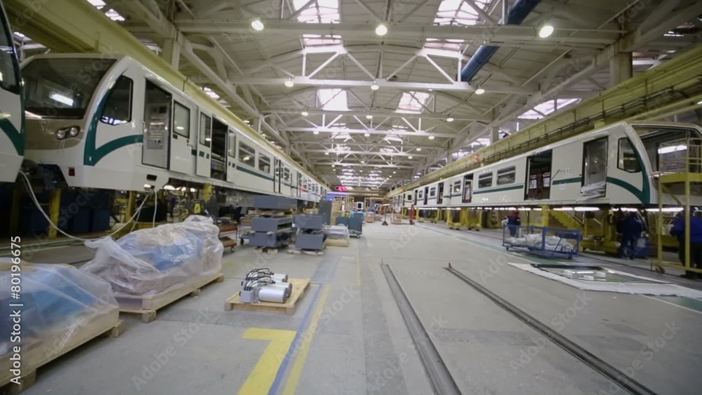 People work at train assemblage in factory Stock Video | Adobe Stock