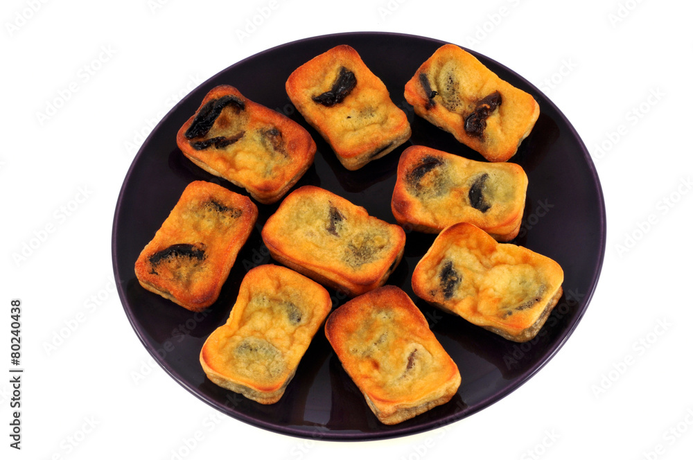 Petits fars aux pruneaux dans un plat Stock Photo | Adobe Stock