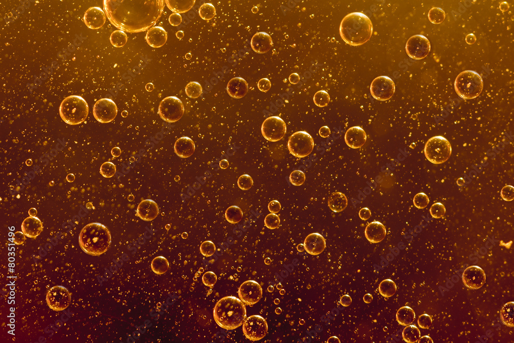 Orange bubbles floating in water Stock Photo | Adobe Stock