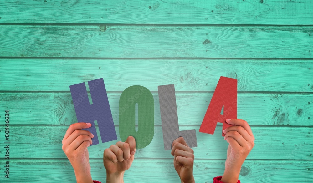 Composite image of hands holding up hola Stock Photo | Adobe Stock