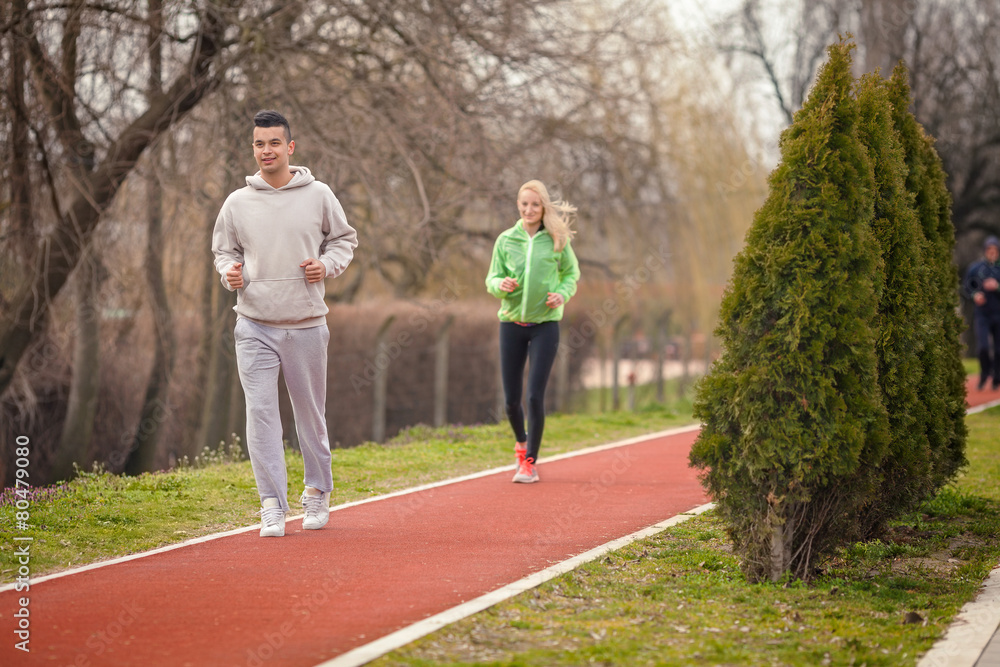 People Jogging In Park