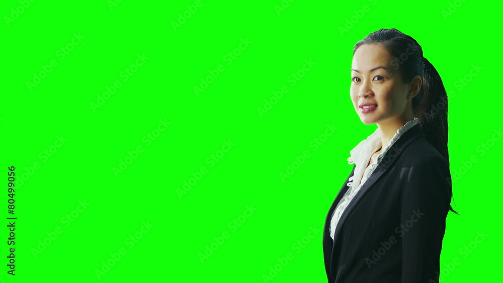 Portrait of attractive successful businesswoman on green screen ...
