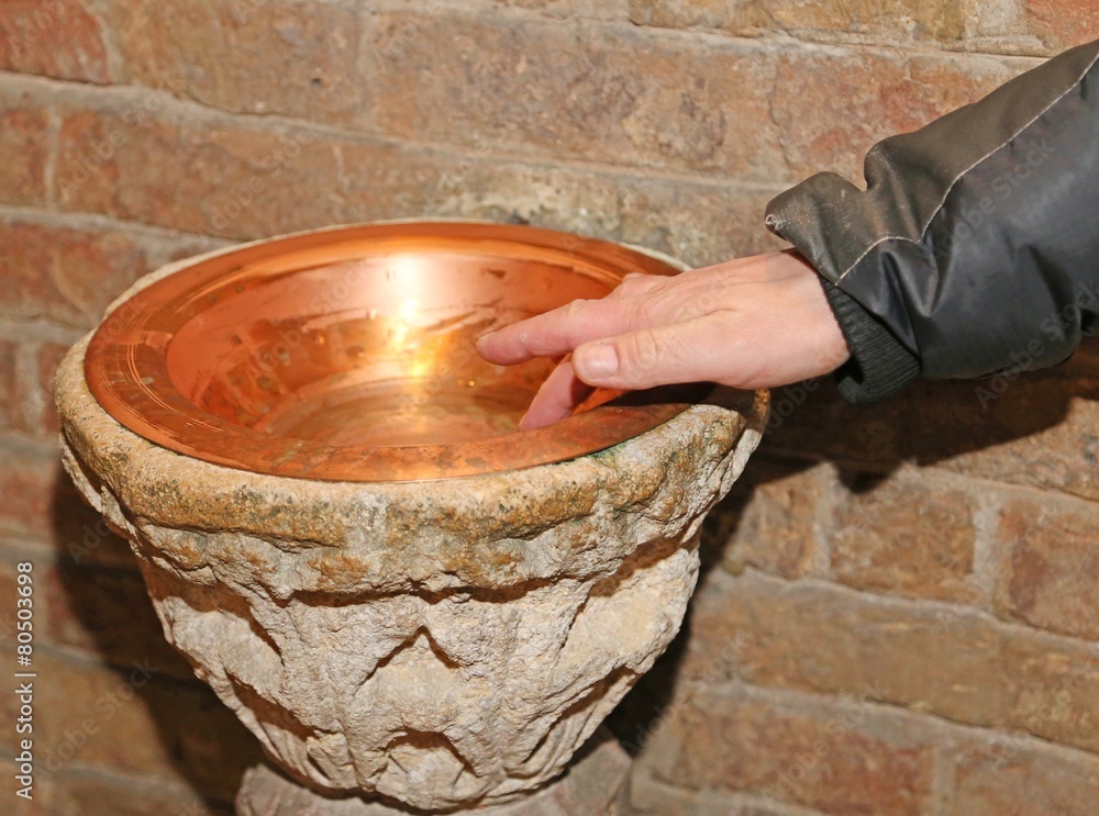 hand of man and an ancient stoup inside the Church Stock Photo | Adobe ...