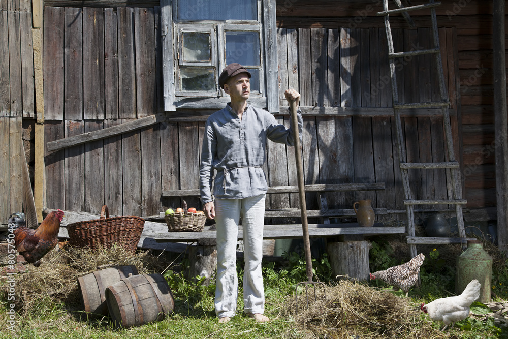 Countryside man with a pitchfork Stock-Foto | Adobe Stock