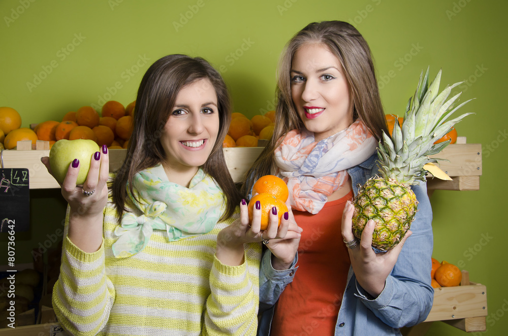 Natural pretty girls smiling while holding fruit, healthy life Stock ...