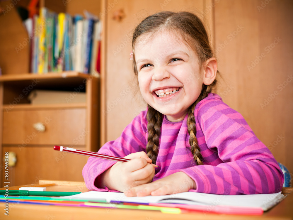 Preschooler child drawing in sketchbook Stock Photo | Adobe Stock