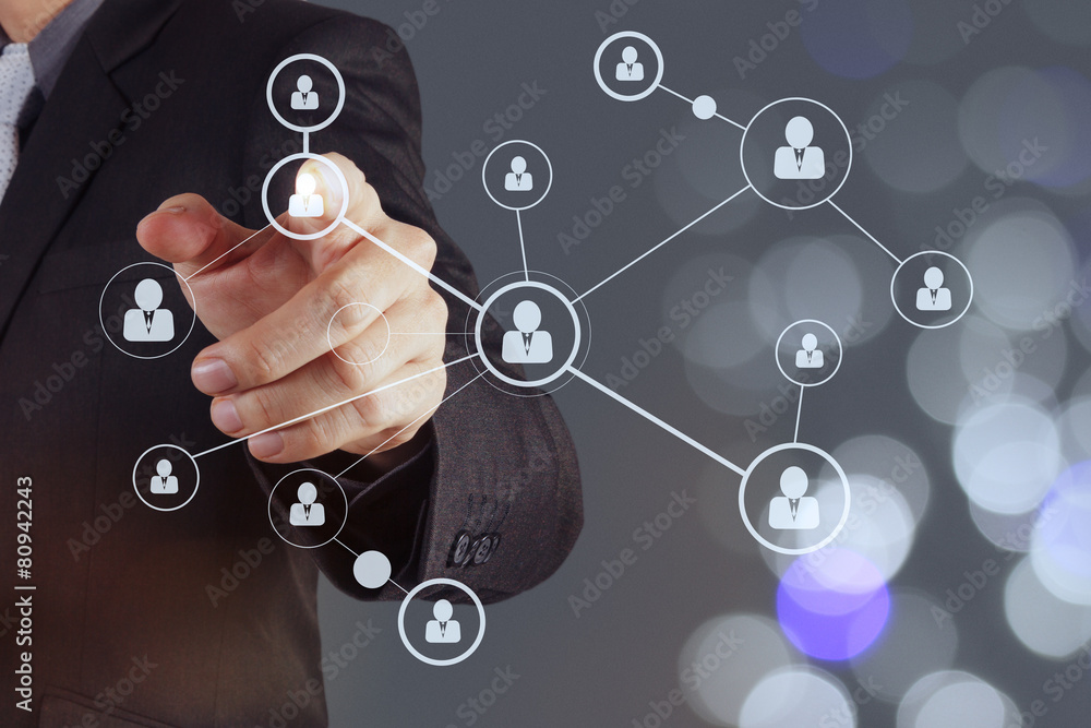 businessman hand showing human icon flow chart on new modern com Stock ...
