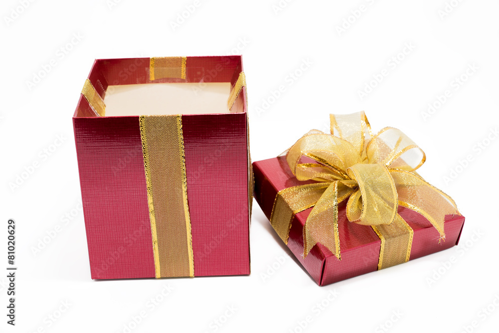 Red gift box with gold ribbon Stock Photo | Adobe Stock