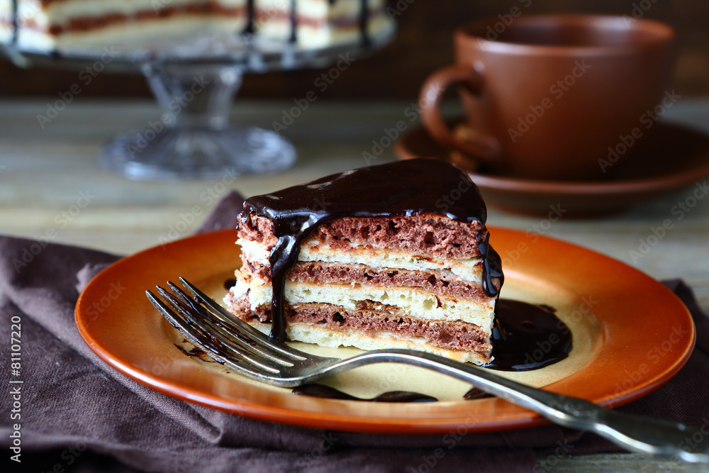 Piece of cake with hot chocolate on a plate Stock Photo | Adobe Stock
