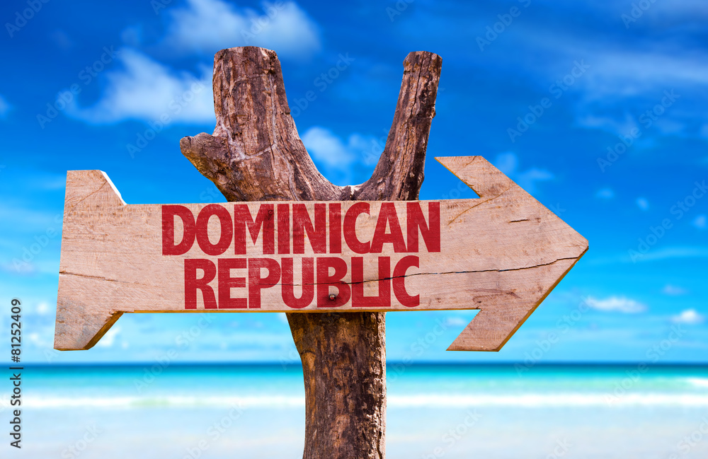 Dominican Republic wooden sign with beach background Stock Photo ...