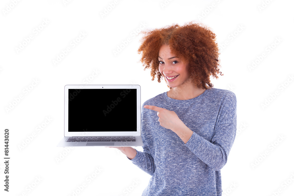 Black African American student girl holding a laptop and pointin Stock ...