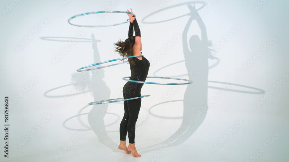 Spinning acrobat beautiful hula hoops in slow motion Stock Video ...