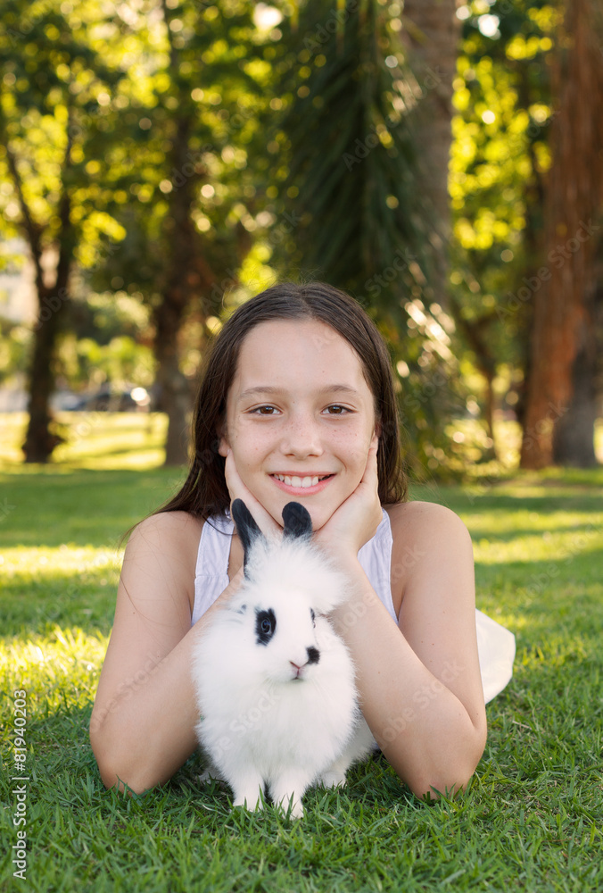 Cute beautiful smiling teen girl with white-black baby rabbit Stock ...
