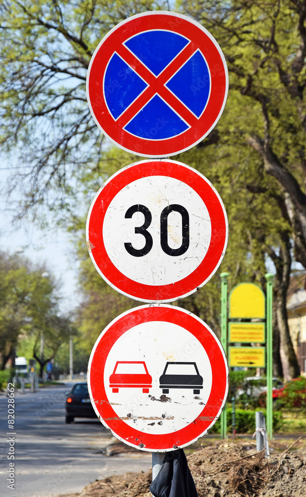 No overtaking, no stopping and speed limit traffic signs Stock Photo ...