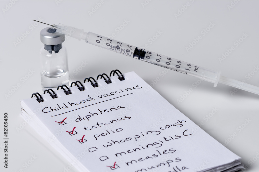 Immunization checklist with syringe and ampoule in background Stock ...