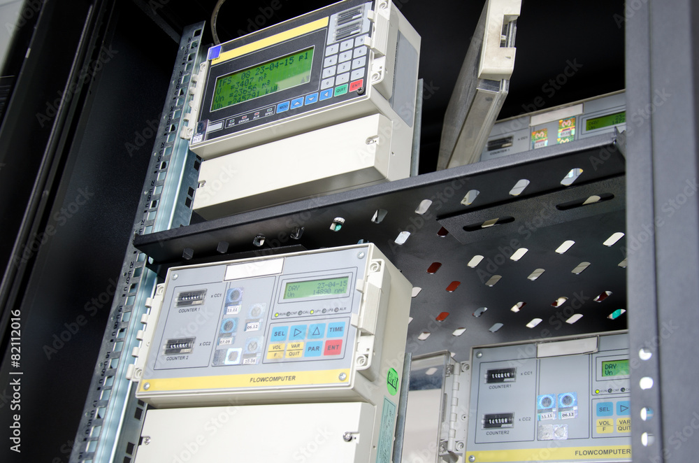 Digital gas meter, mounted in rack Stock Photo | Adobe Stock