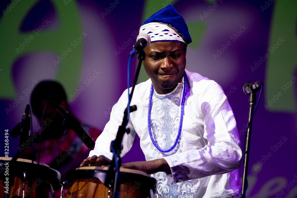 African man singing and playing ethnic drums 2 Stock-Foto | Adobe Stock