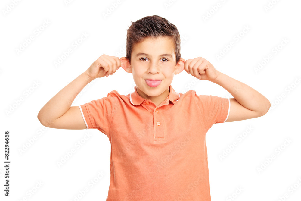 Silly boy making face and sticking his tongue out Stock Photo | Adobe Stock
