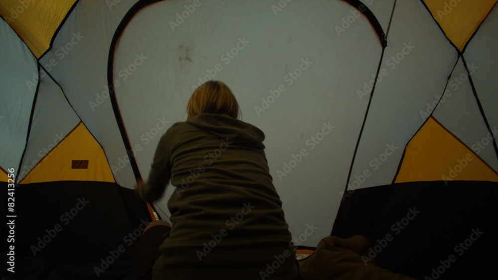 woman coming out of a tent Stock Video | Adobe Stock